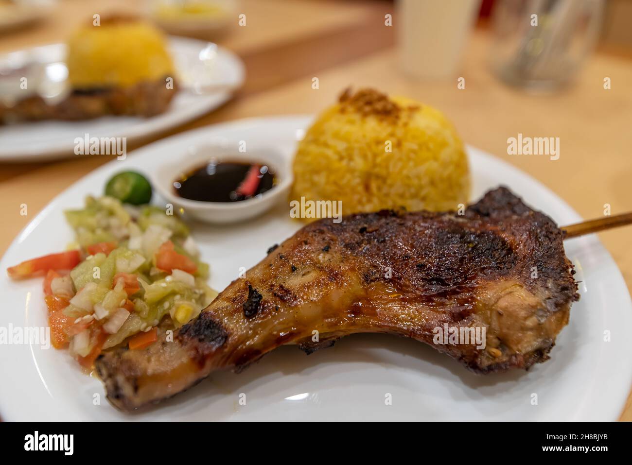 Popular Filipino food chicken inasal at the Restaurant Stock Photo - Alamy