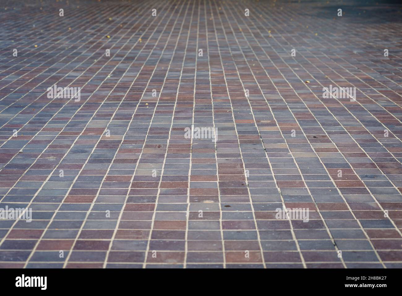 Vintage Old tile floor pavement pattern background Stock Photo - Alamy