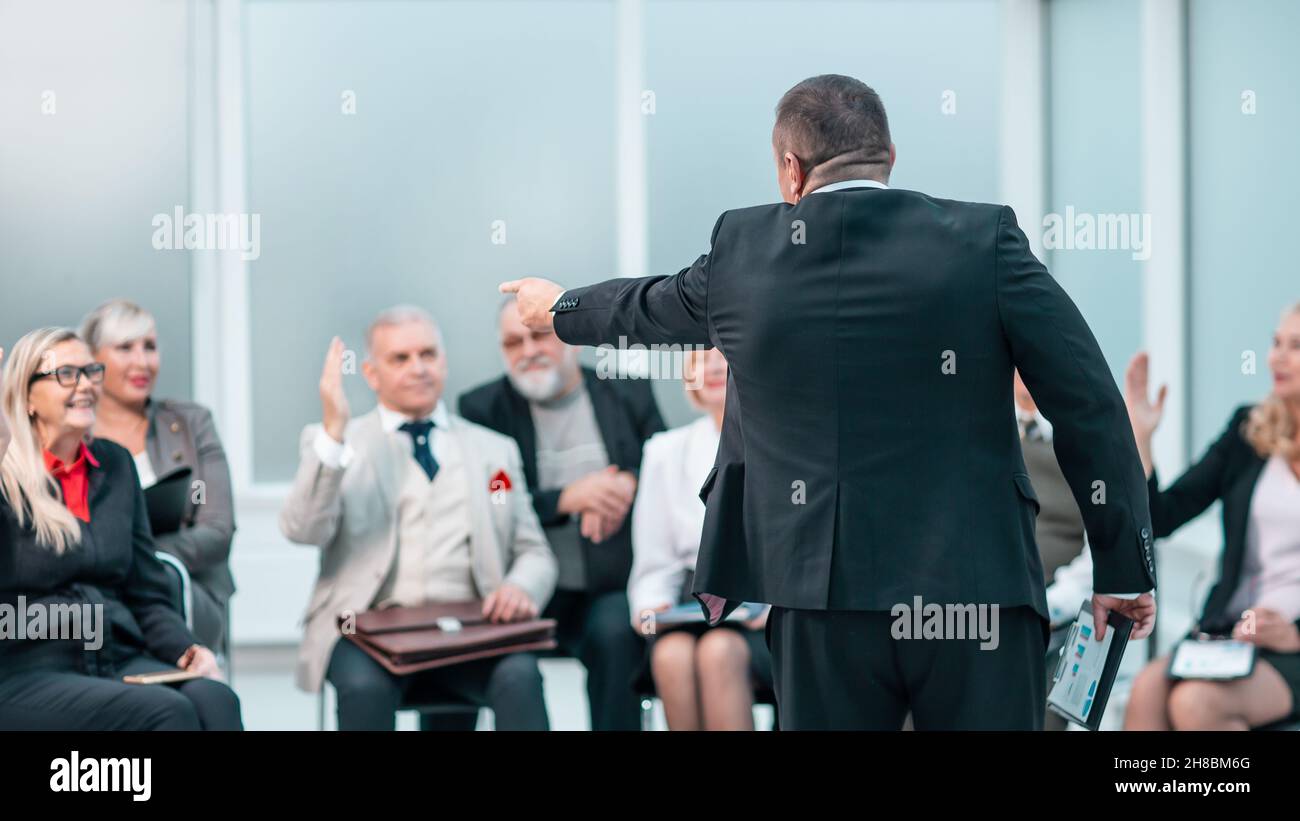 Audience answering questions speaker hi-res stock photography and ...