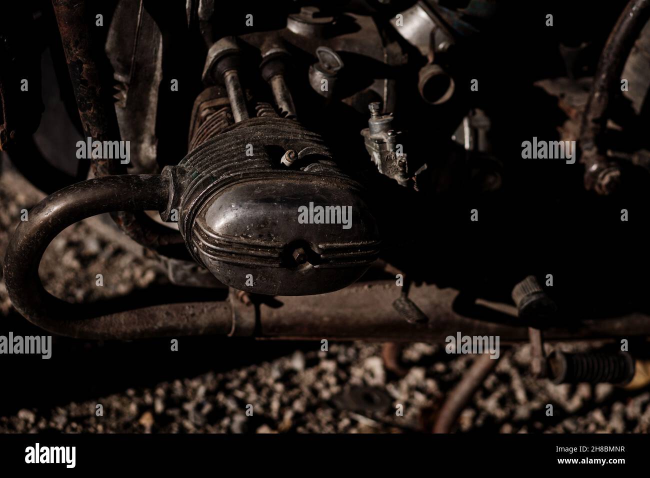old, rusty motor bike. iron exhaust pipe of a motorcycle. vintage moto ...