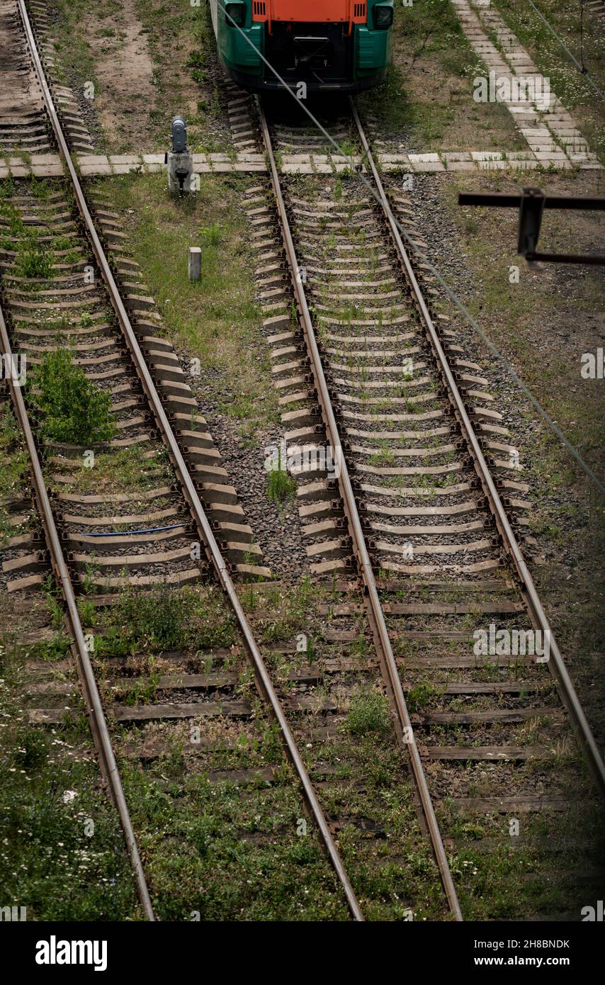 passenger train passes through the railway tracks. the concept of a ...