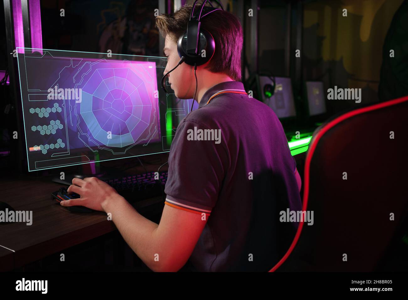 Cyber sport. Fully concentrated professional cybersport player playing ...