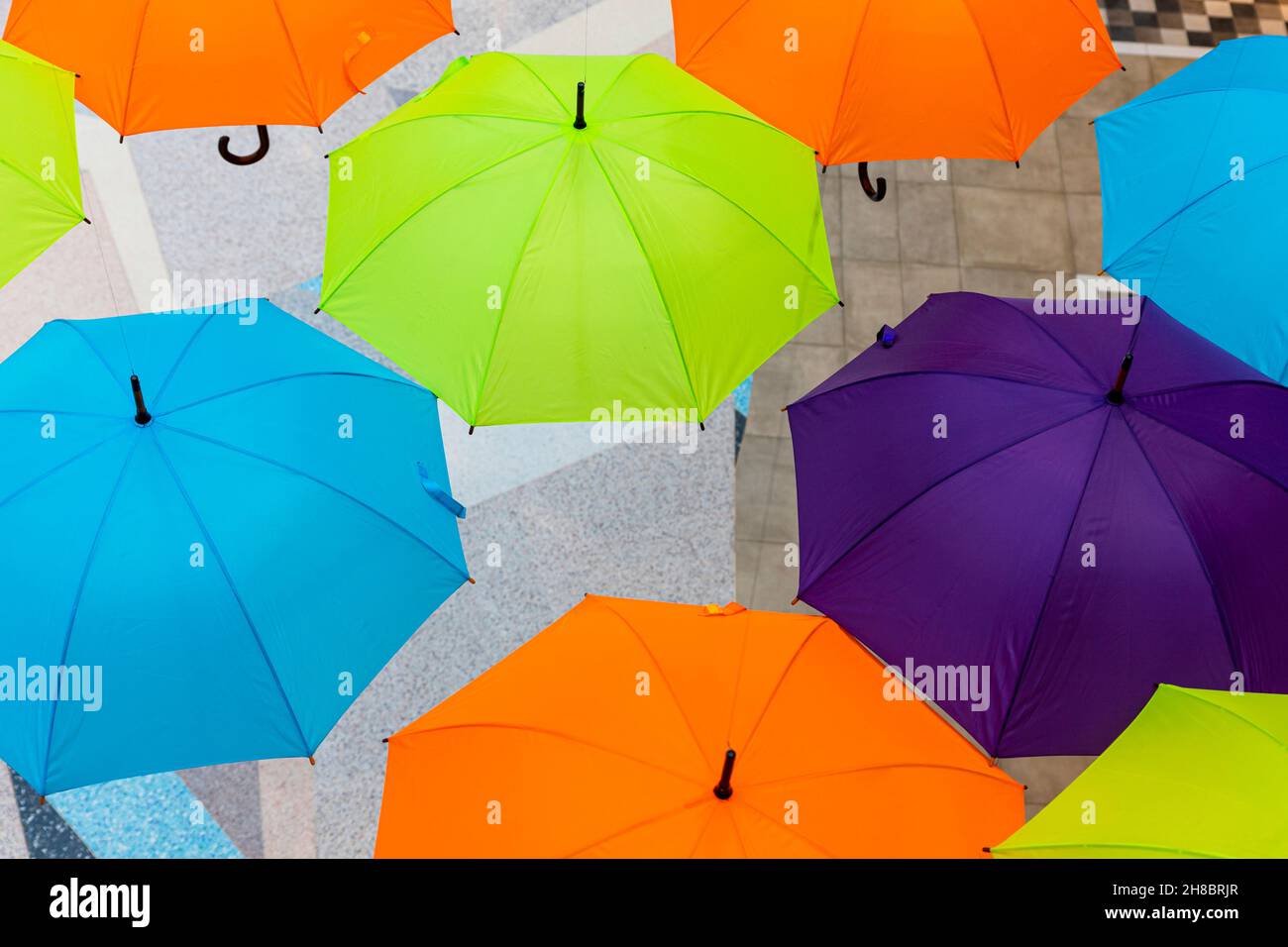 Multiple colorful umbrellas. Fashion and accesories concept Stock Photo ...