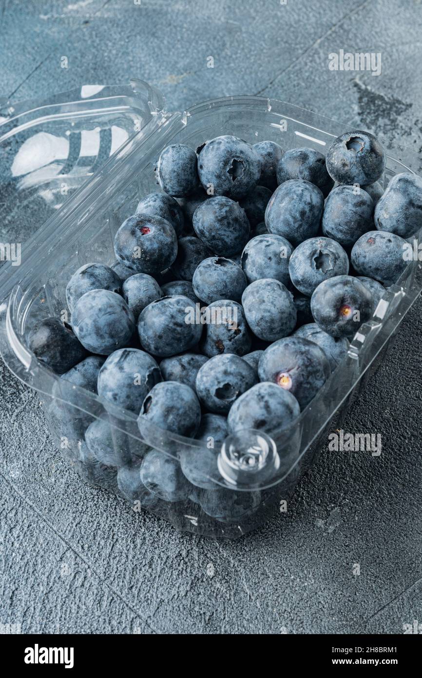 Organic blueberrie in plastic box package, on gray background Stock ...