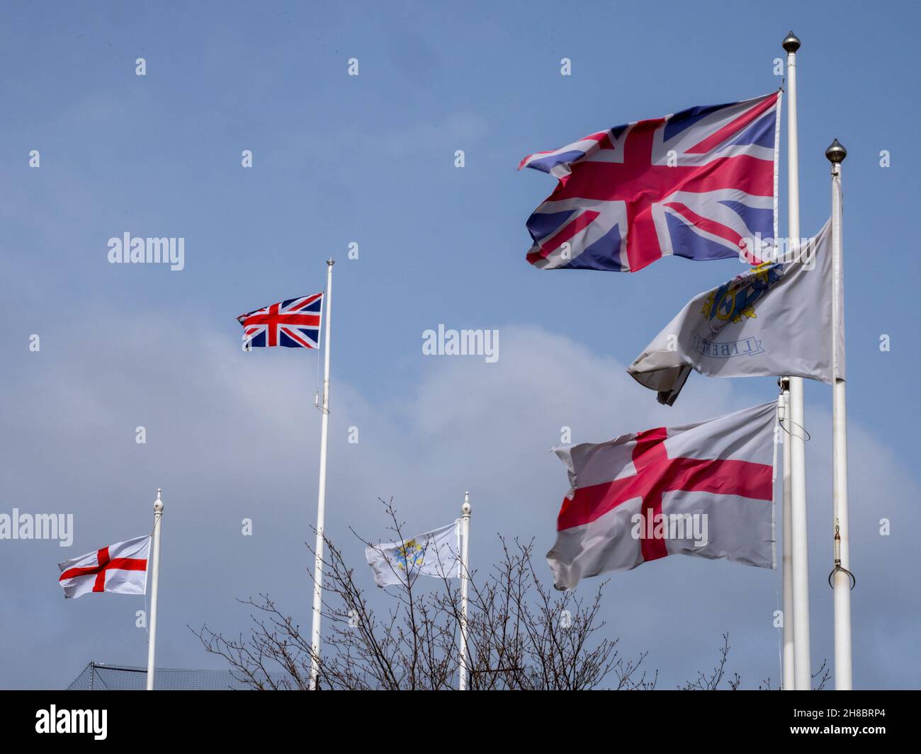 British and English flags fly above Havering Town Hall Stock Photo - Alamy