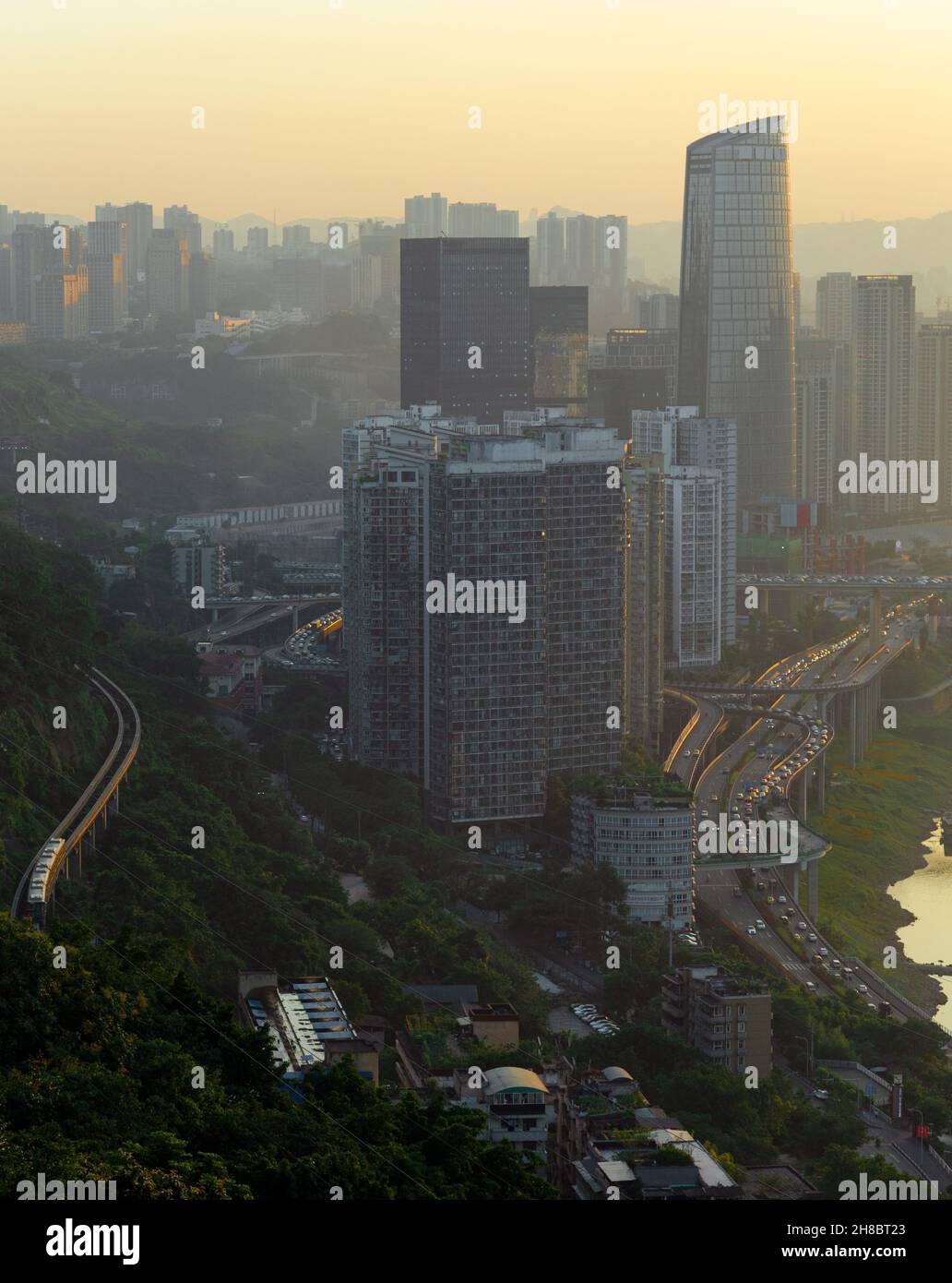 The city on the river bank at sunset. This is Chongqing, China Stock ...