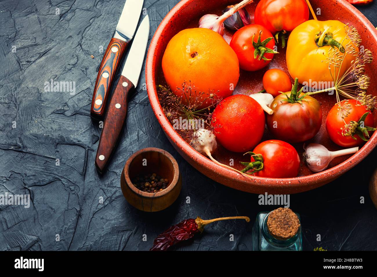 Salted fresh tomatoes.Cooking process,canned tomatoes.Pickled ...
