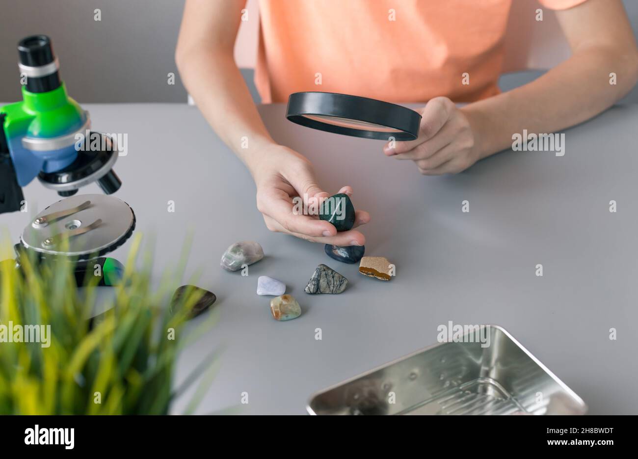 Magnifying glass examine child desk hi-res stock photography and images ...