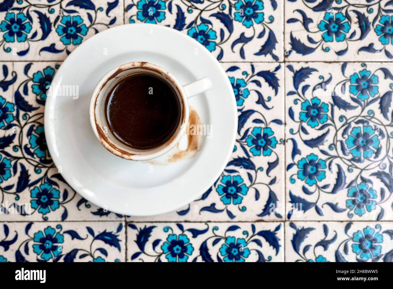 Leftover coffee, sediment, precipitate black turkish coffee in ceramic ...