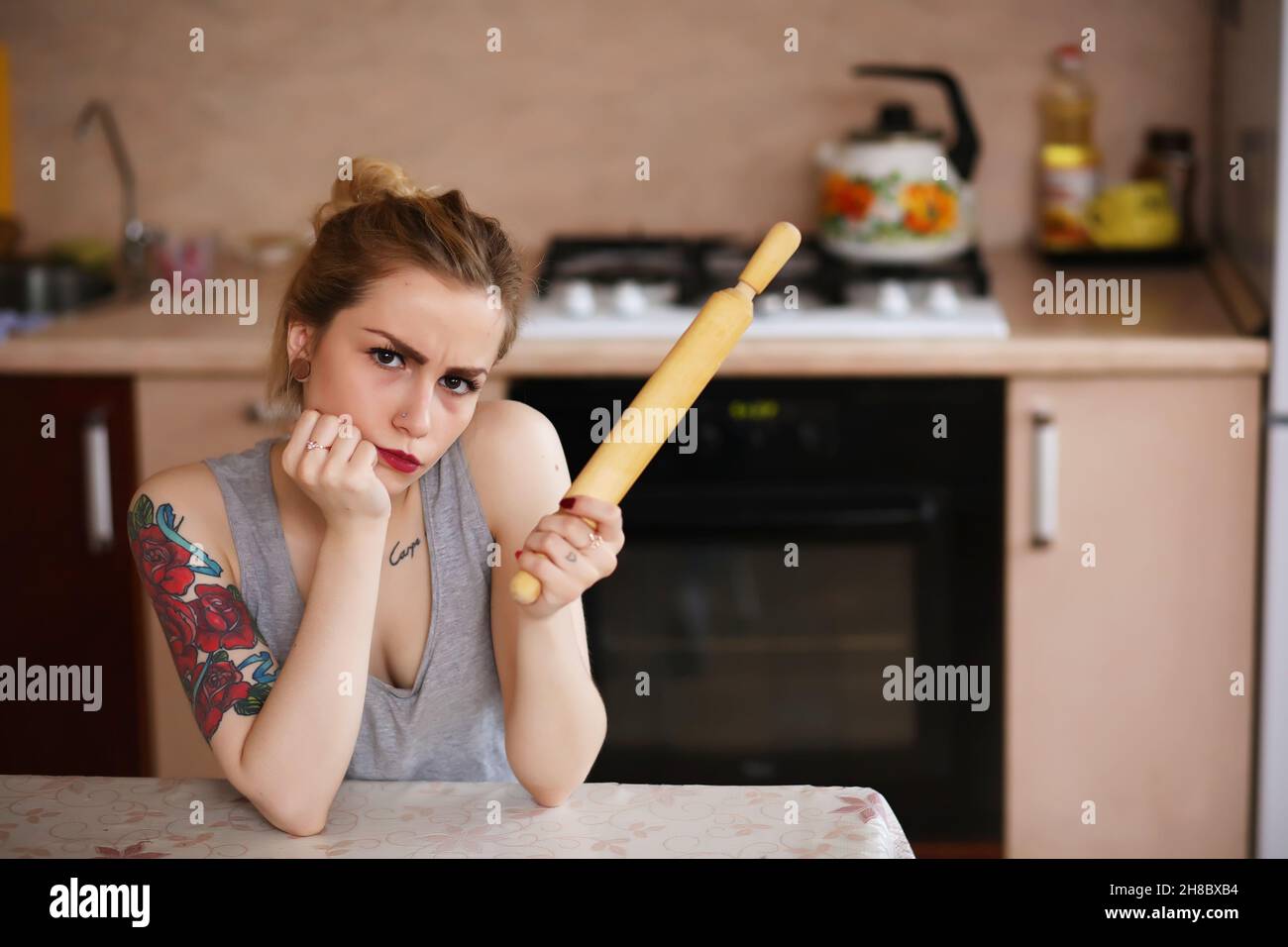 Pretty girl posing at camera in retro apartment Stock Photo - Alamy