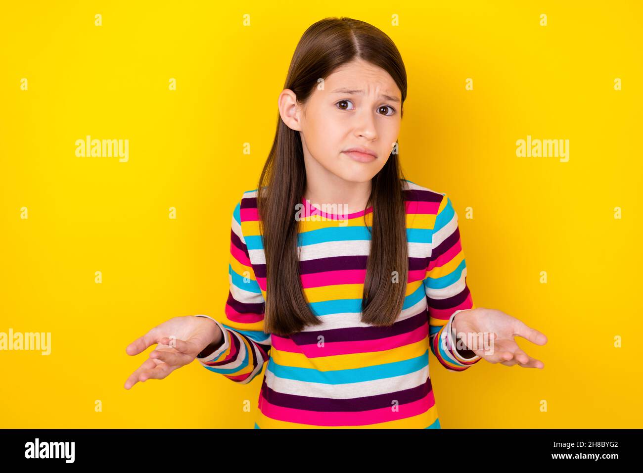 Photo of clueless indifferent little lady shrug shoulders have doubts ...