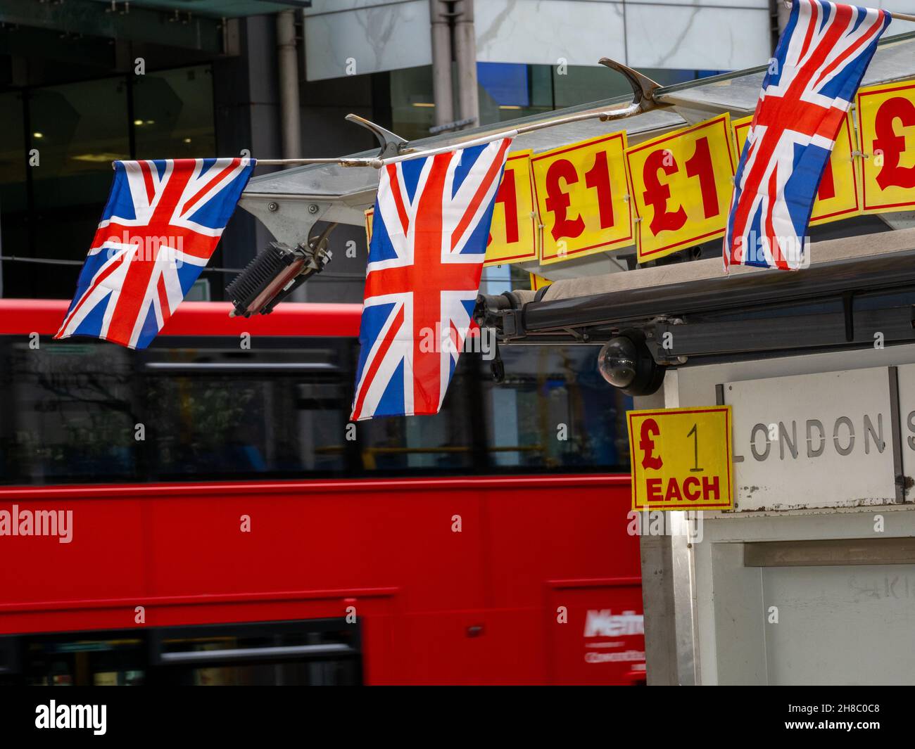 The union flag of Great Britain flying outside a souvenir shop on ...