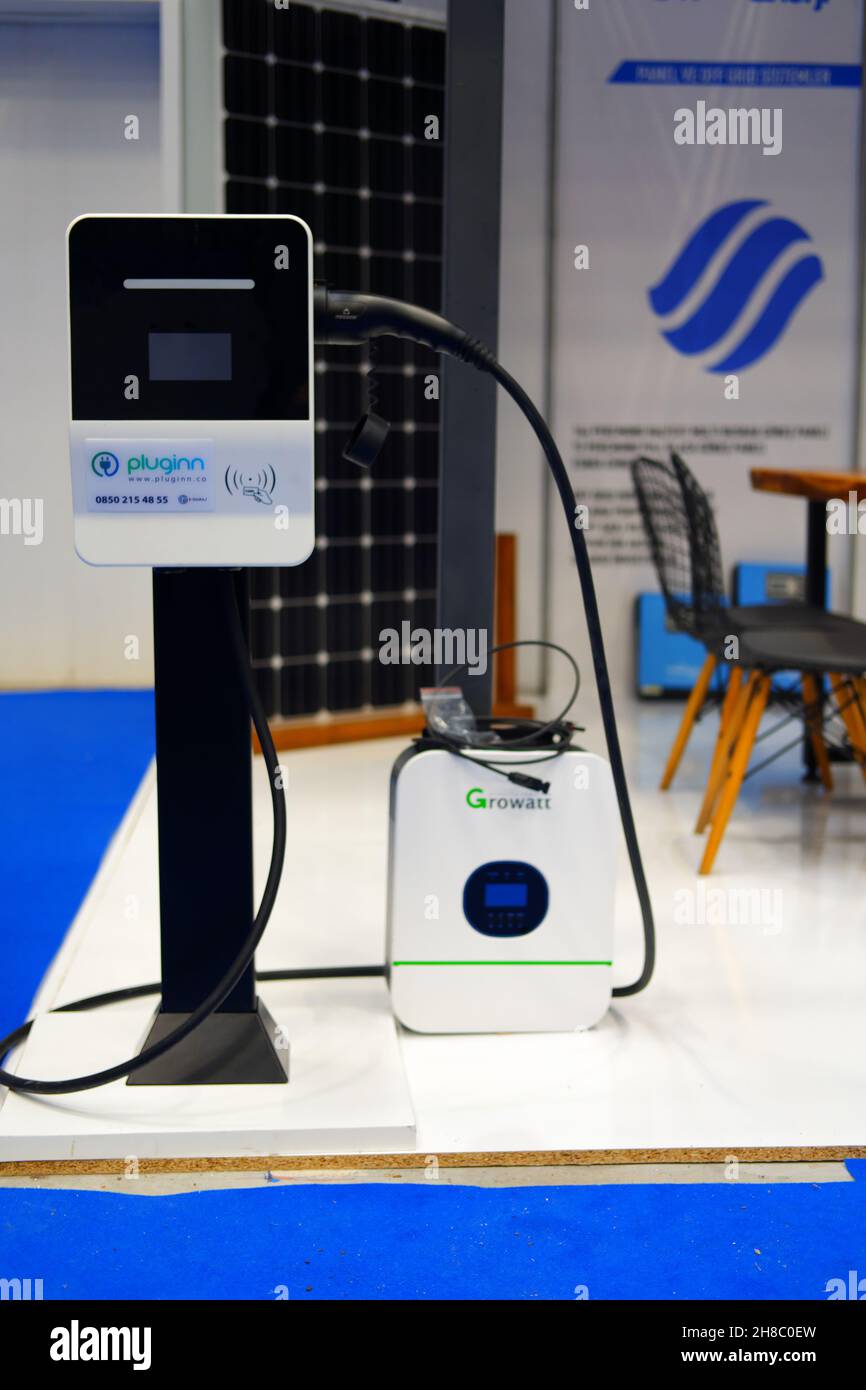 EV Charging Station and Solar Panel at Exhibition Indoor Stock Photo ...