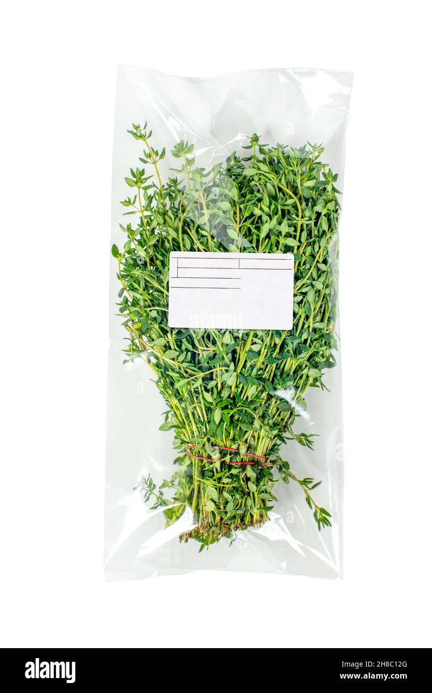 Bunch of fresh thyme packed on an isolated white background Stock Photo ...
