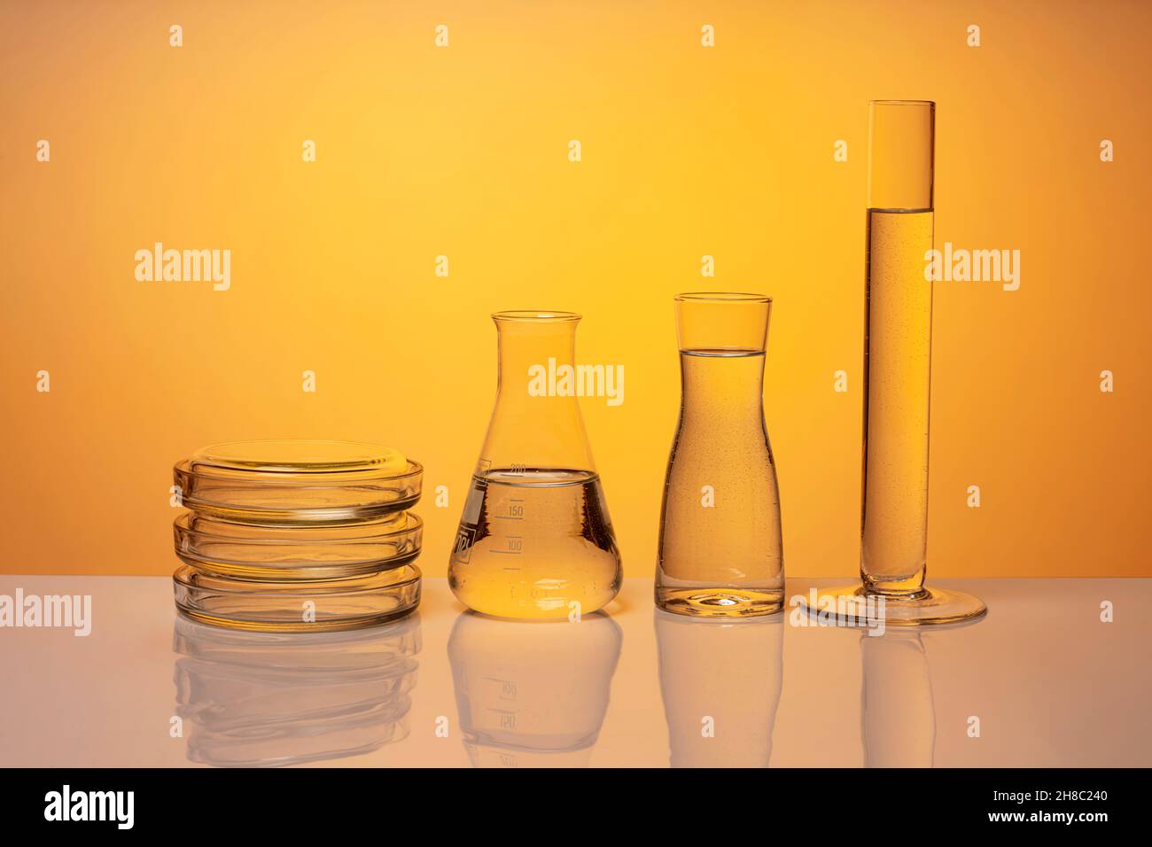 Medical or chemical background with laboratory equipment and liquids ...