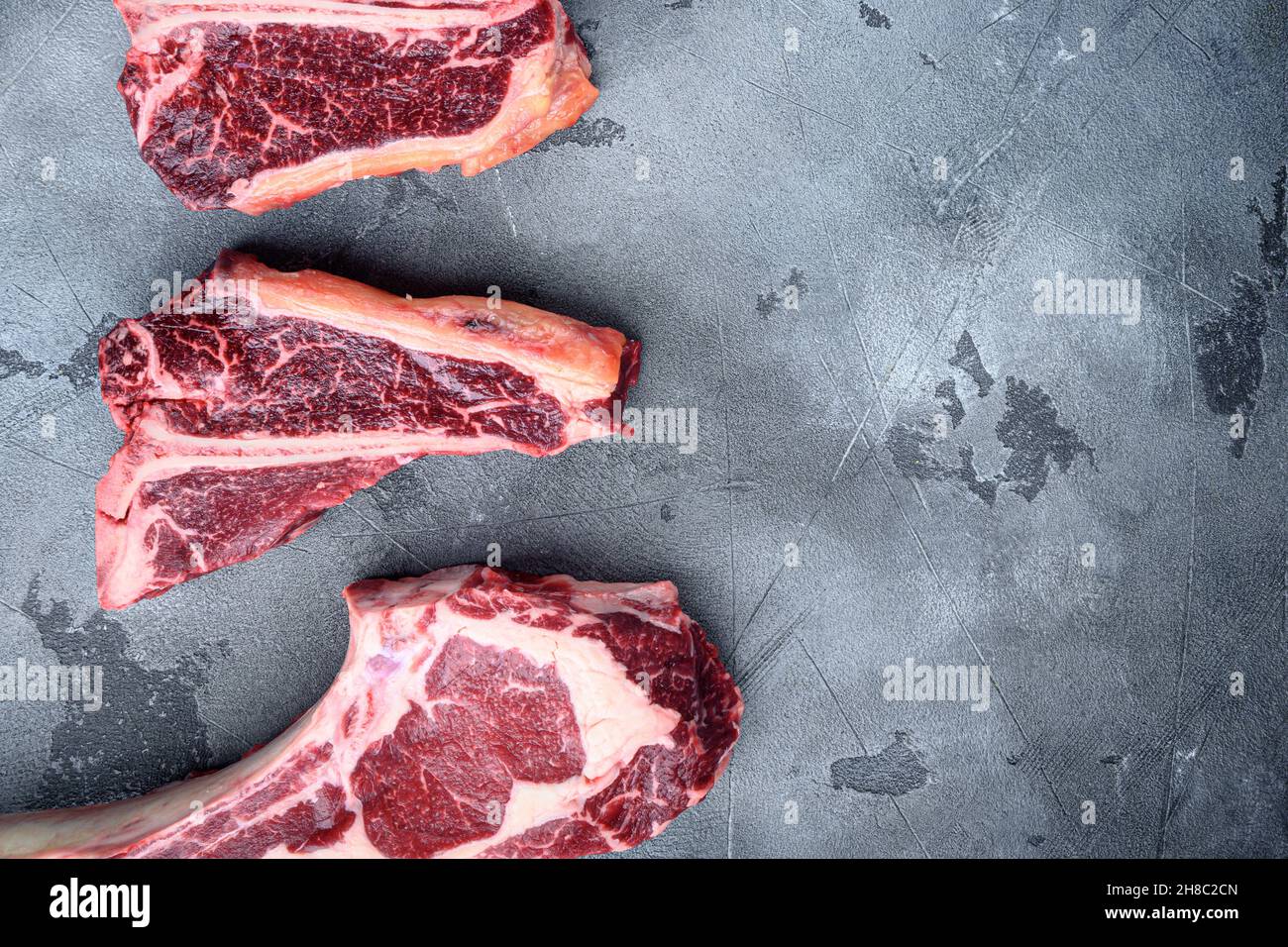 Dry aged Raw porterhouse beef meat Steak set, tomahawk, t bone or ...