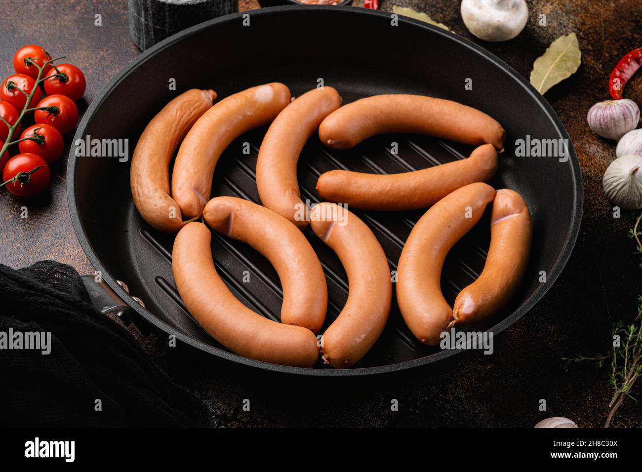 Raw pork and beef mix sausage set, on old dark rustic table background ...