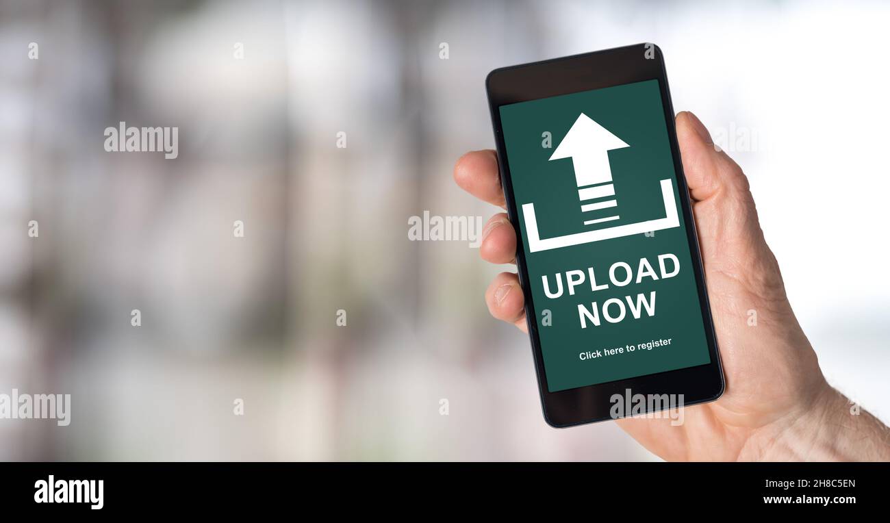 Smartphone screen displaying an upload concept Stock Photo - Alamy