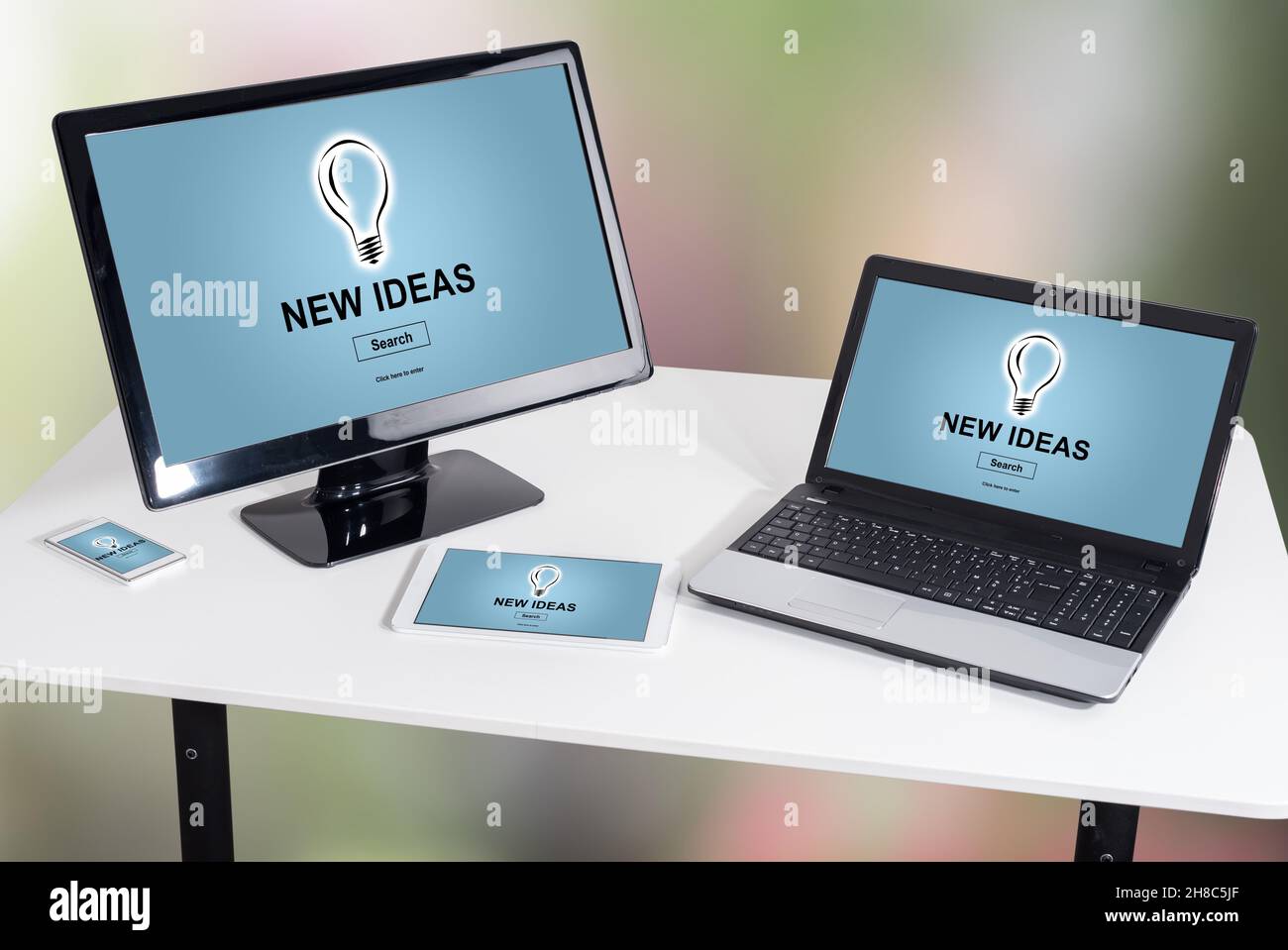 New ideas concept shown on different information technology devices ...