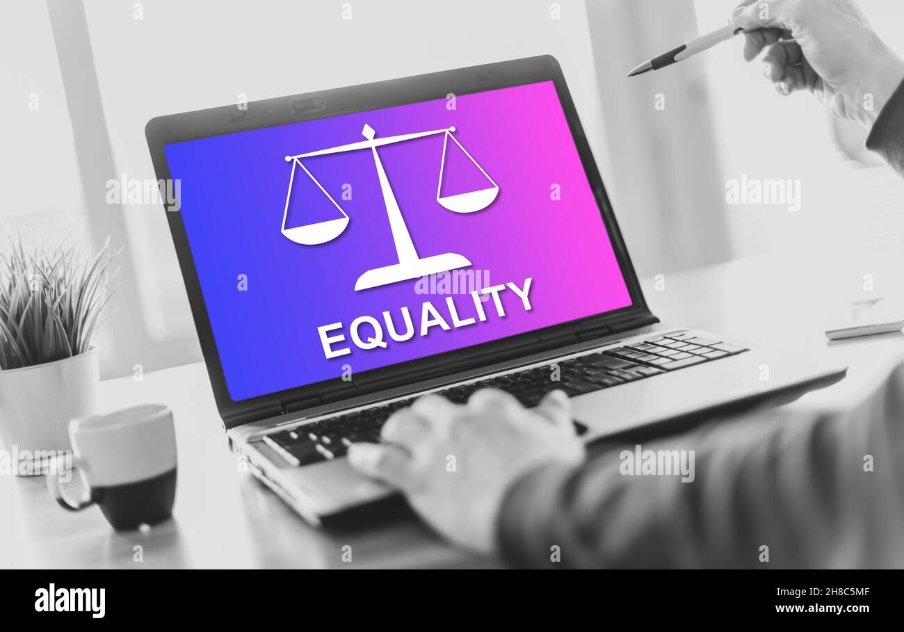 Laptop screen displaying an equality concept Stock Photo - Alamy