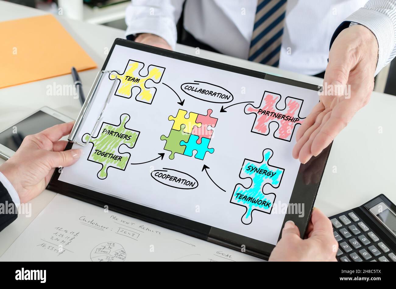 Partnership concept shown by a businessman Stock Photo - Alamy
