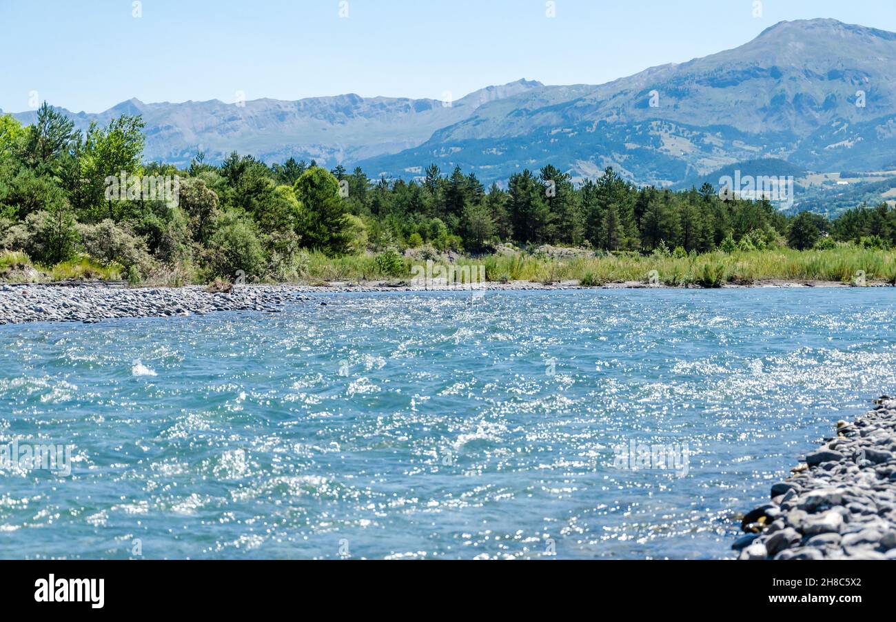 Mountain river in alps Stock Photo - Alamy