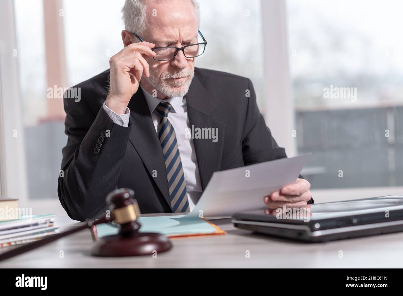 Lawyer working on legal document Stock Photo - Alamy