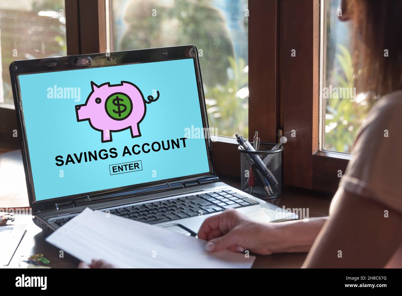 Laptop screen displaying a savings account concept Stock Photo - Alamy