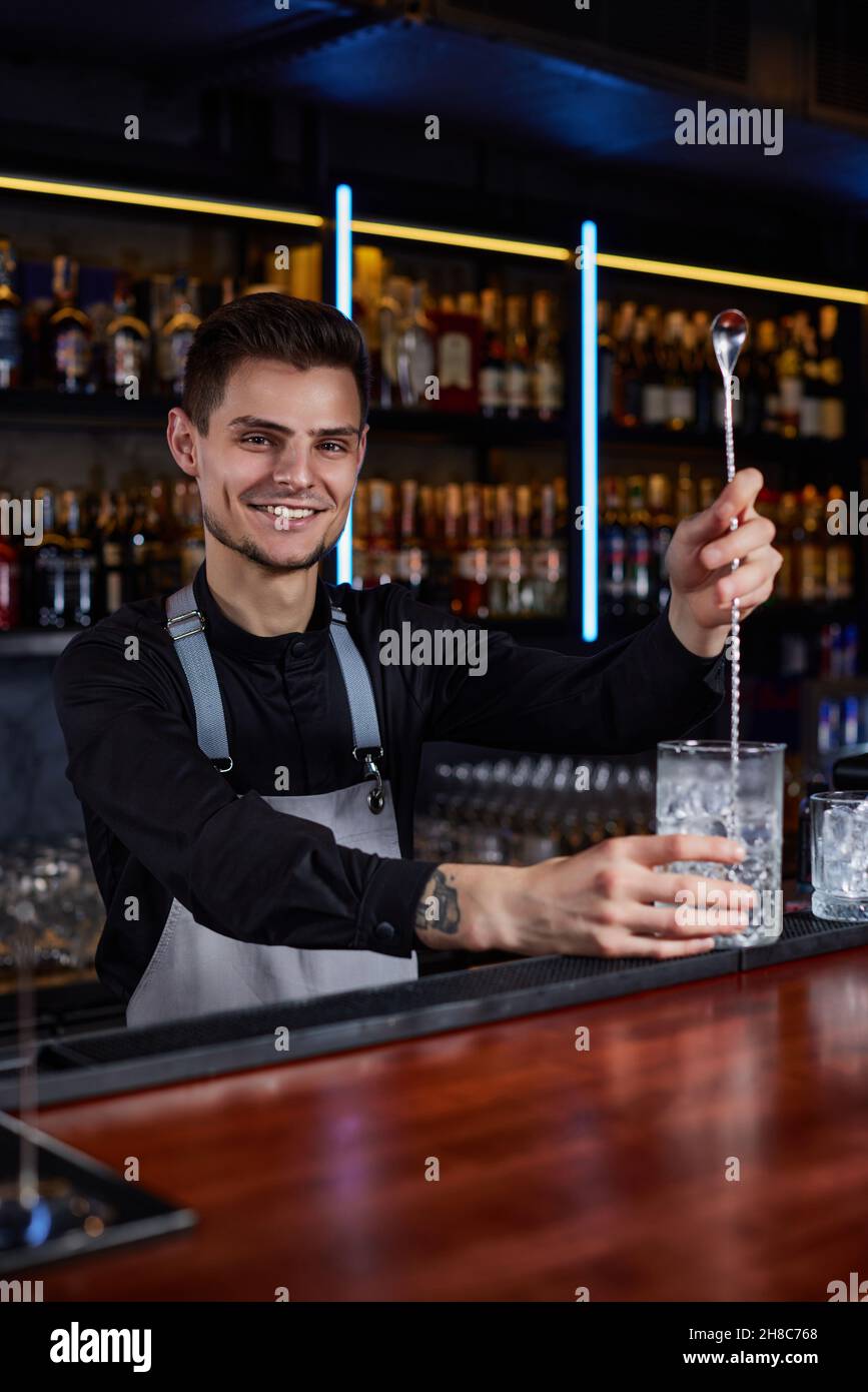 Stirring cocktail in glass spoon hi-res stock photography and images ...