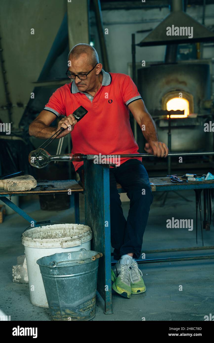 Murano, italy - nov, 2021 Glass blower demonstrate their craft for ...