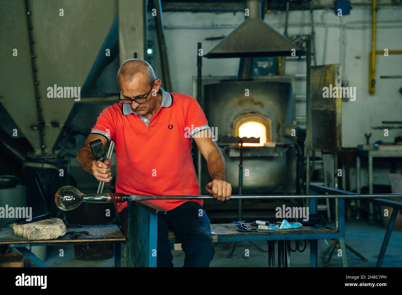 Murano, italy - nov, 2021 Glass blower demonstrate their craft for ...
