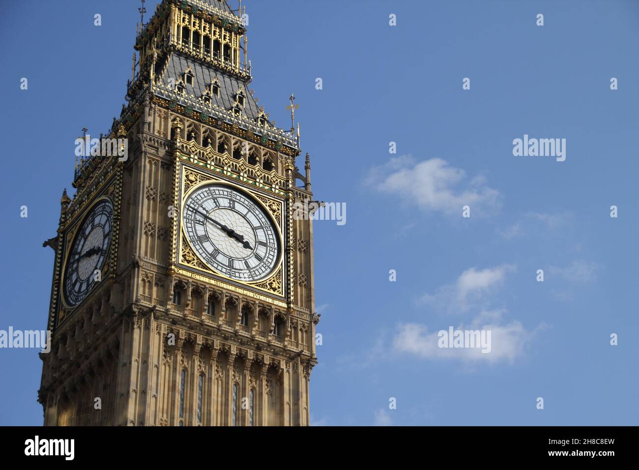 Low angle of the famous Big Ben Mitcham UK against a blue sky Stock ...