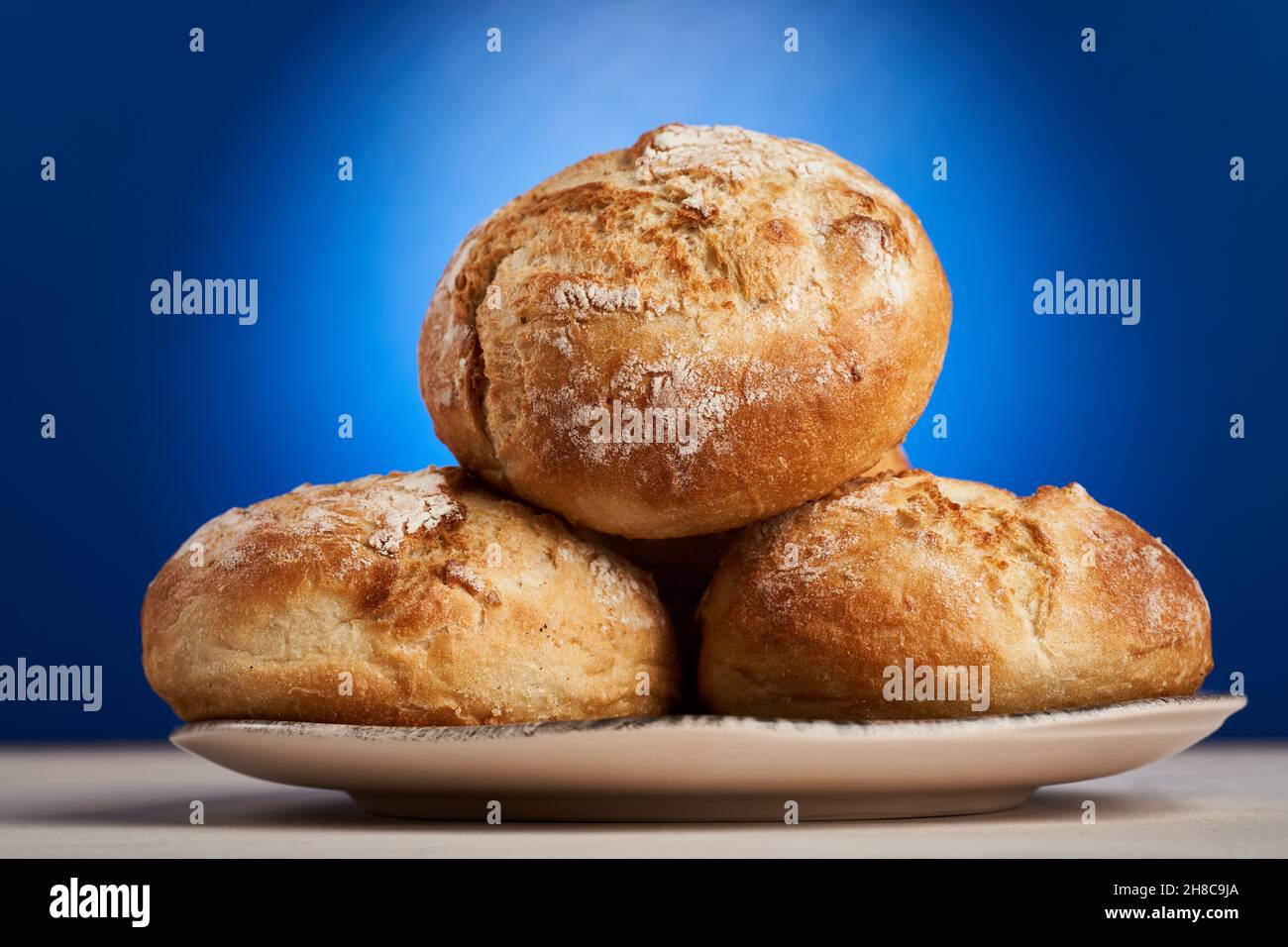 A pile of healthy whole grain bread buns on a plate Stock Photo - Alamy