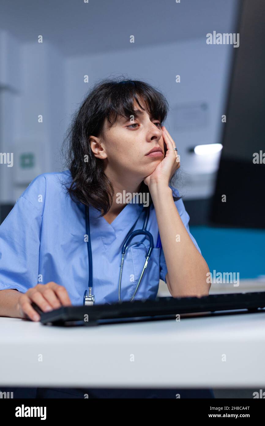 Medic assistant looking computer monitor hi-res stock photography and ...
