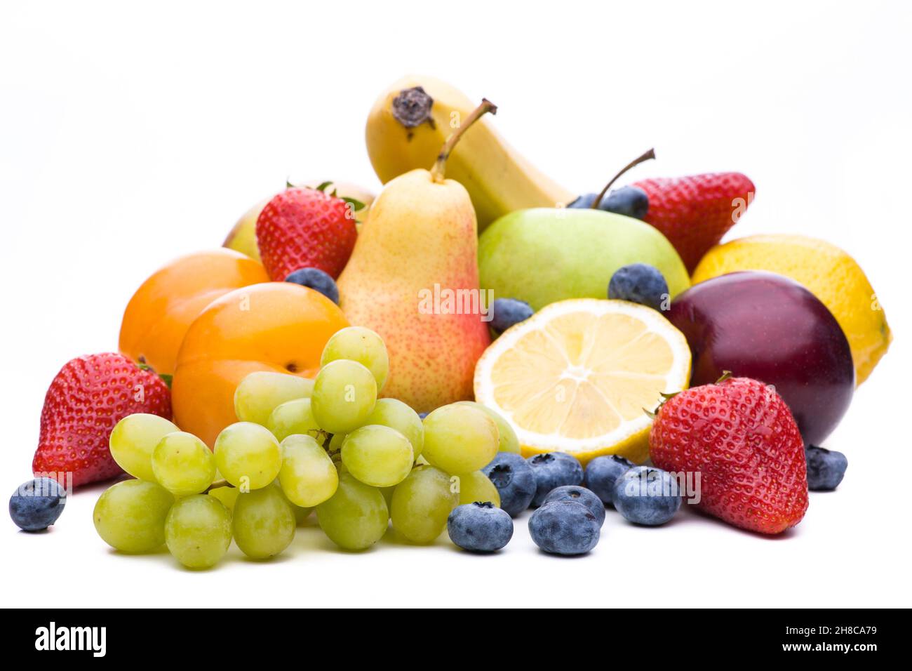 Colorful mix of many different types of fruit Stock Photo - Alamy