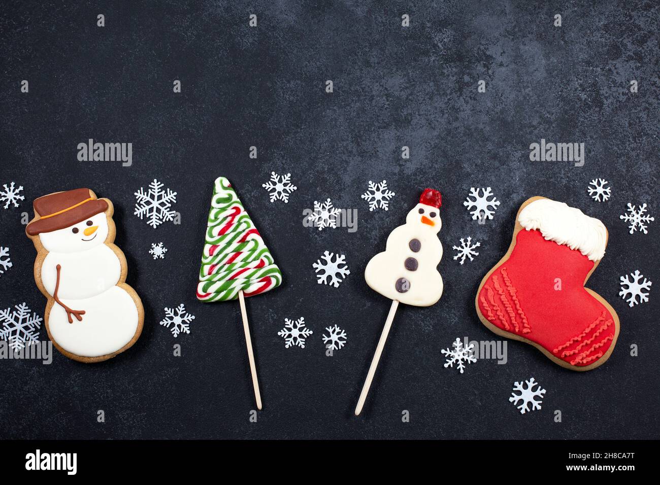 Christmas candies in the shape of a snowman, christmas tree, santa ...