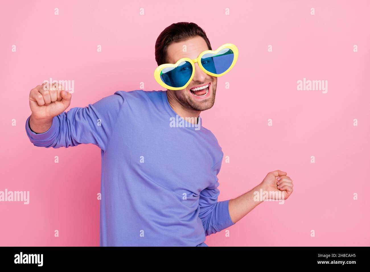 Photo of brunet cool guy dance wear spectacles blue sweater isolated on ...