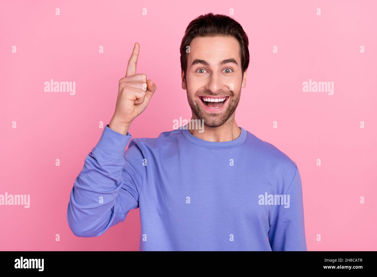 Photo of beard cool guy index up wear blue pullover isolated on pastel ...