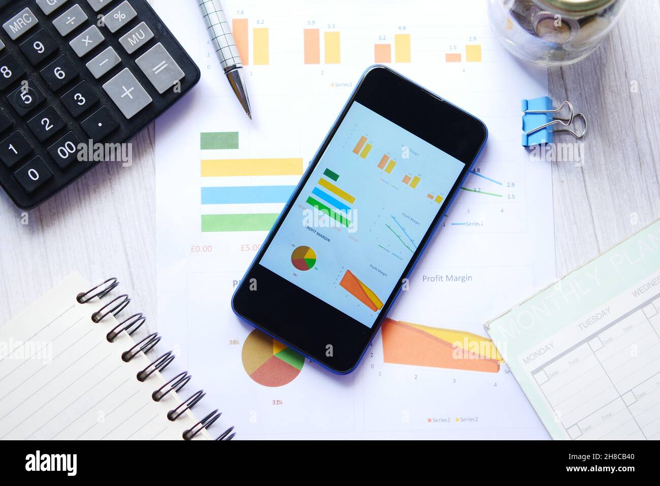 top view of financial chart display on smart phone on table Stock Photo ...