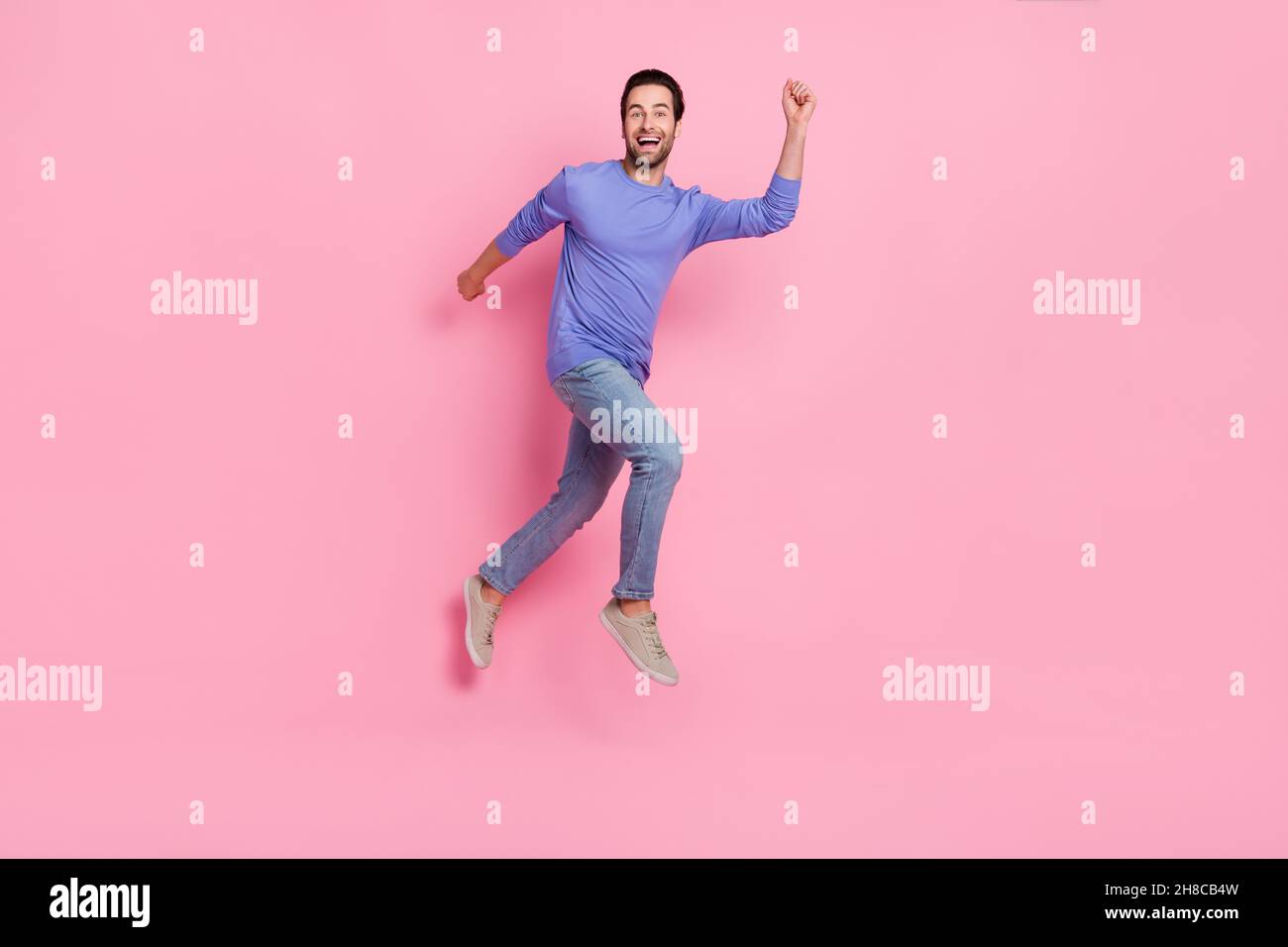 Full body photo of brunet cool young guy run wear blue sweater jeans ...