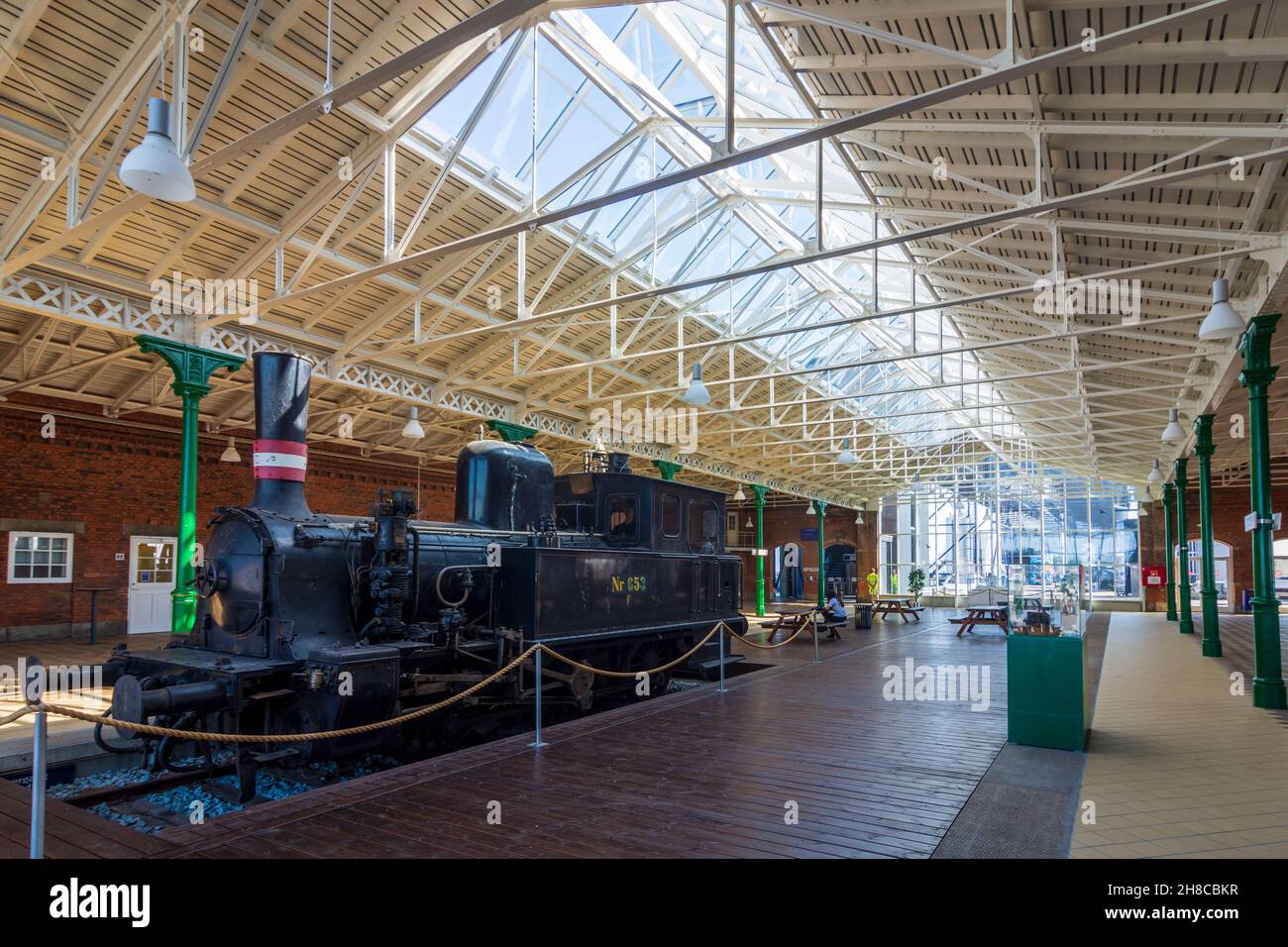 Old railway station with steam locomotive in gedser hi-res stock ...