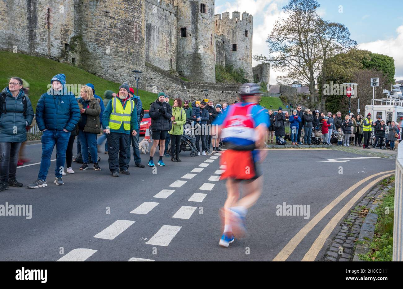 Runners at the finish line after competing in the Conwy 2021 half ...