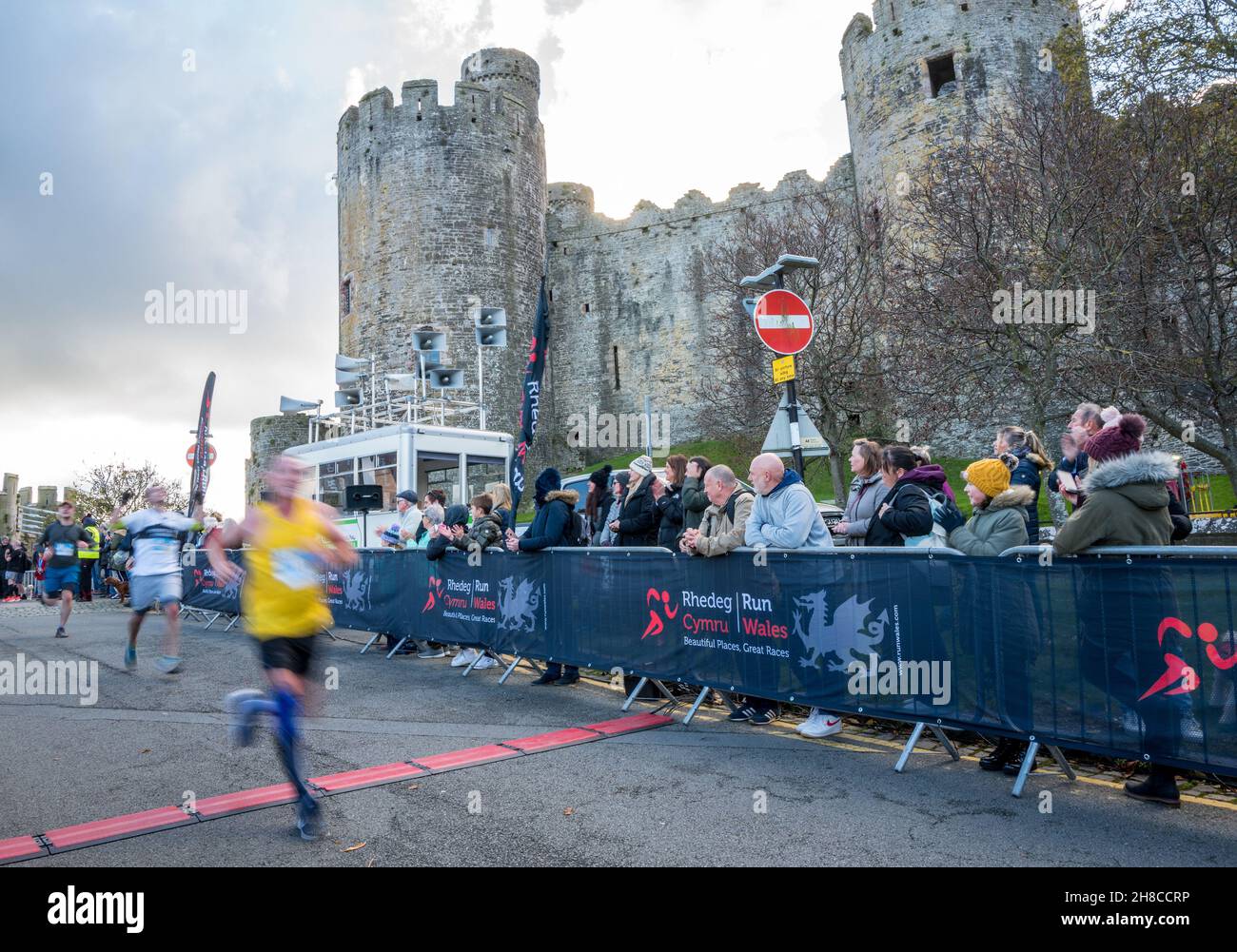 Runners at the finish line after competing in the Conwy 2021 half ...