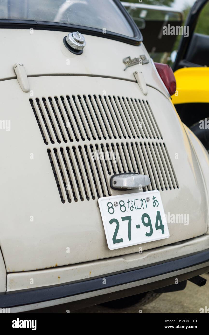 Close up detail of the rear engine cover vents on a white Subaru 360 ...