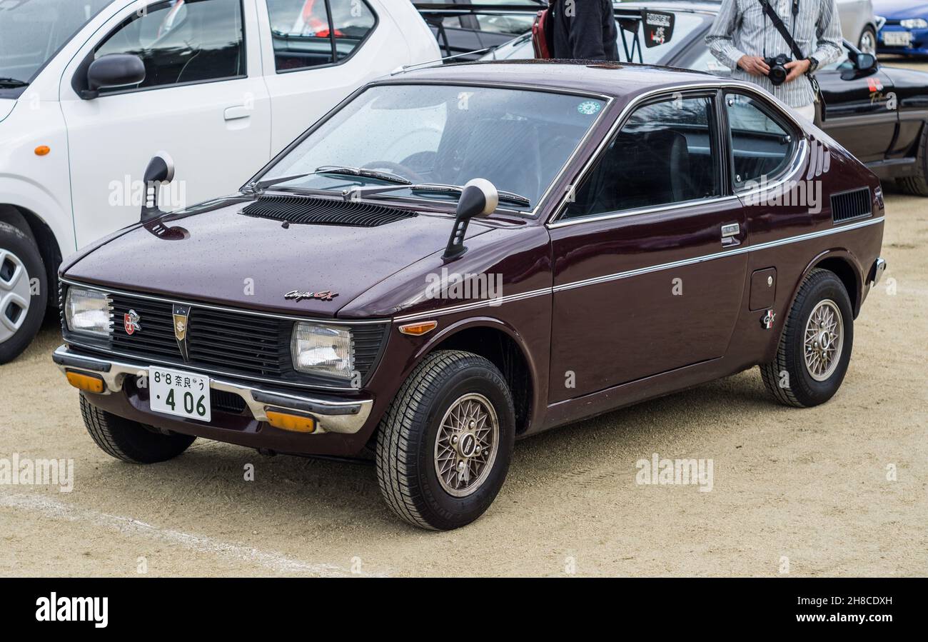 Close up detail of a dark purple brown Suzuki Fronte Coupe GX LC10W Japanese classic kei car ...