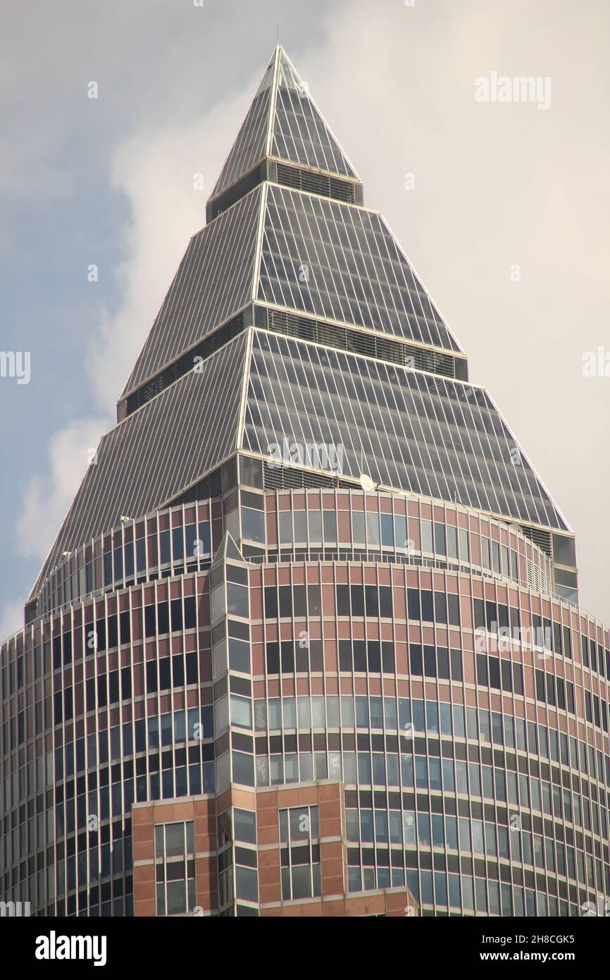 Low angle of a modern skyscraper building landscape, pyramid design in ...