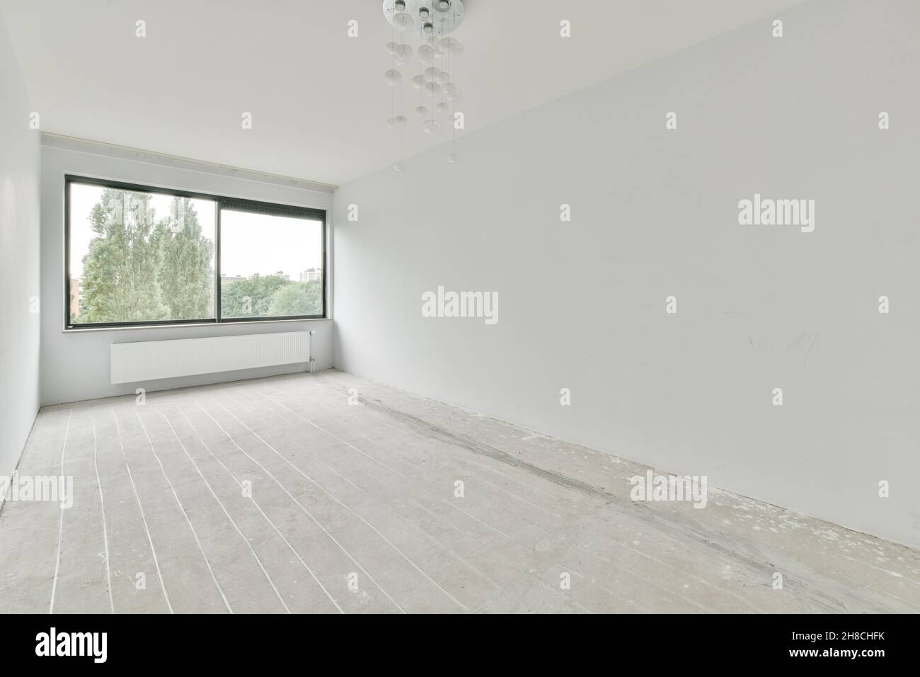 Delightful light and pretty room with large windows Stock Photo - Alamy