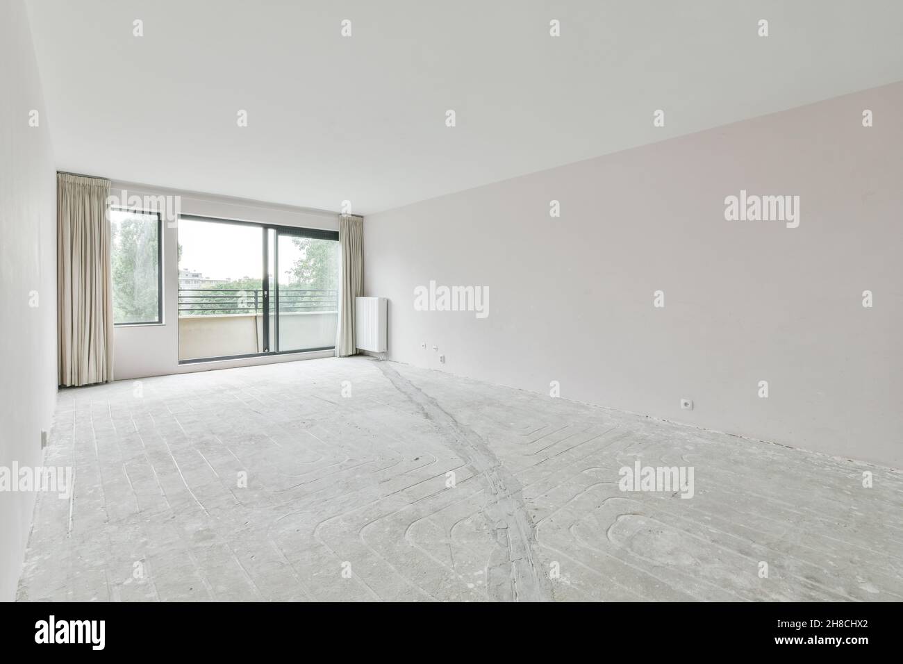 Delightful light and pretty room with large windows Stock Photo - Alamy