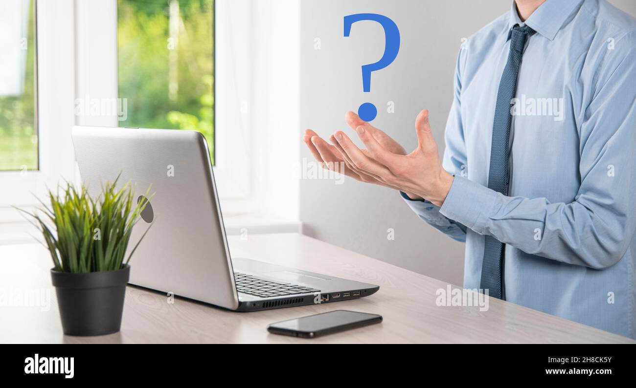 Businessman man hand hold interface question marks sign web. Ask ...