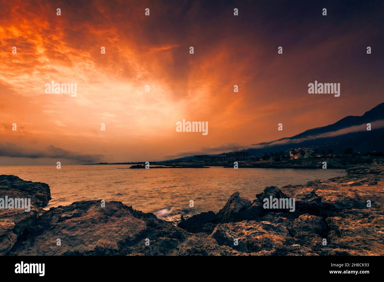 Scenic shot of the colorful sunset at the beach in the Northern Cyprus ...